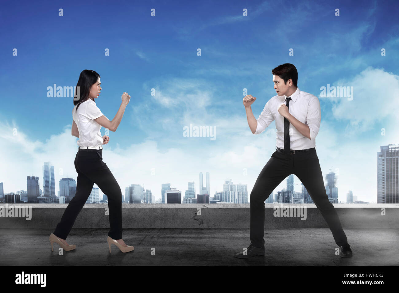 Business man and woman fighting. Working competition concept Stock ...