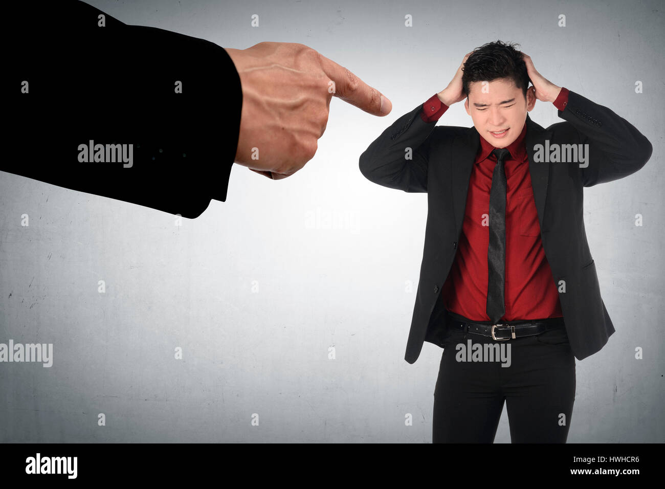 Concept of accused businessman with fingers pointing Stock Photo - Alamy