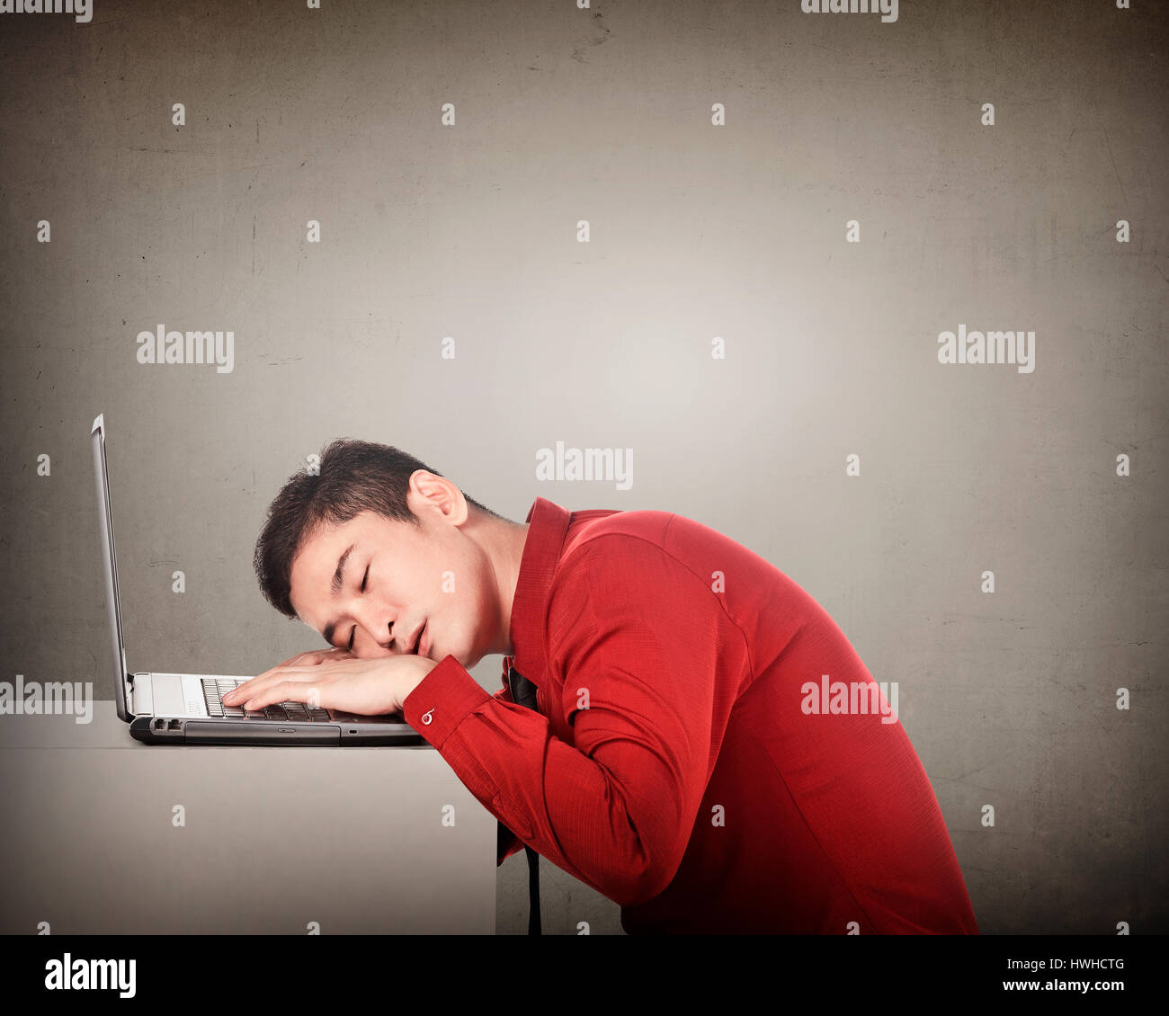 Business man sleeping in front of his laptop. Overwork concept Stock ...