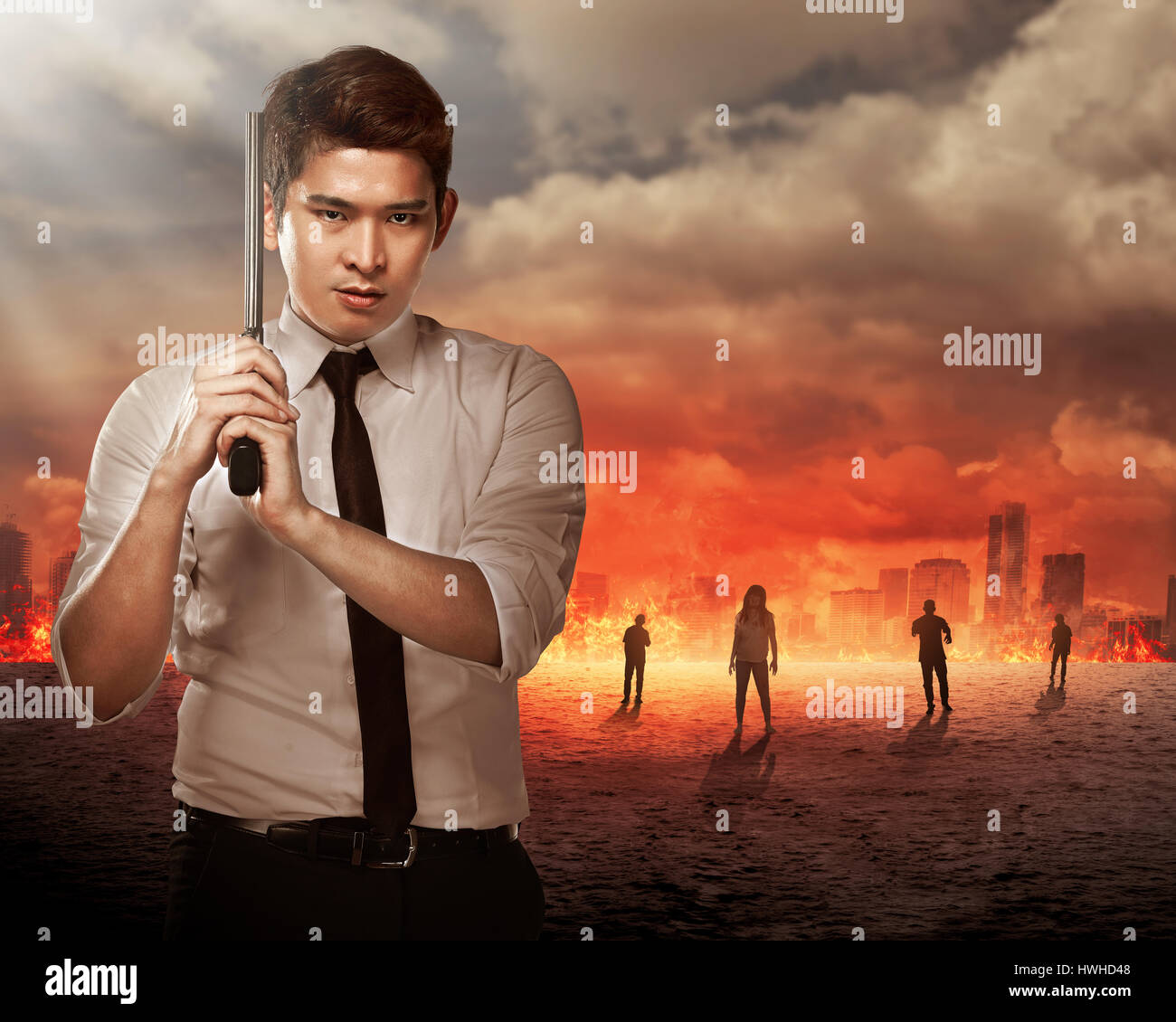 Secret agent holding gun ready to fire Stock Photo - Alamy