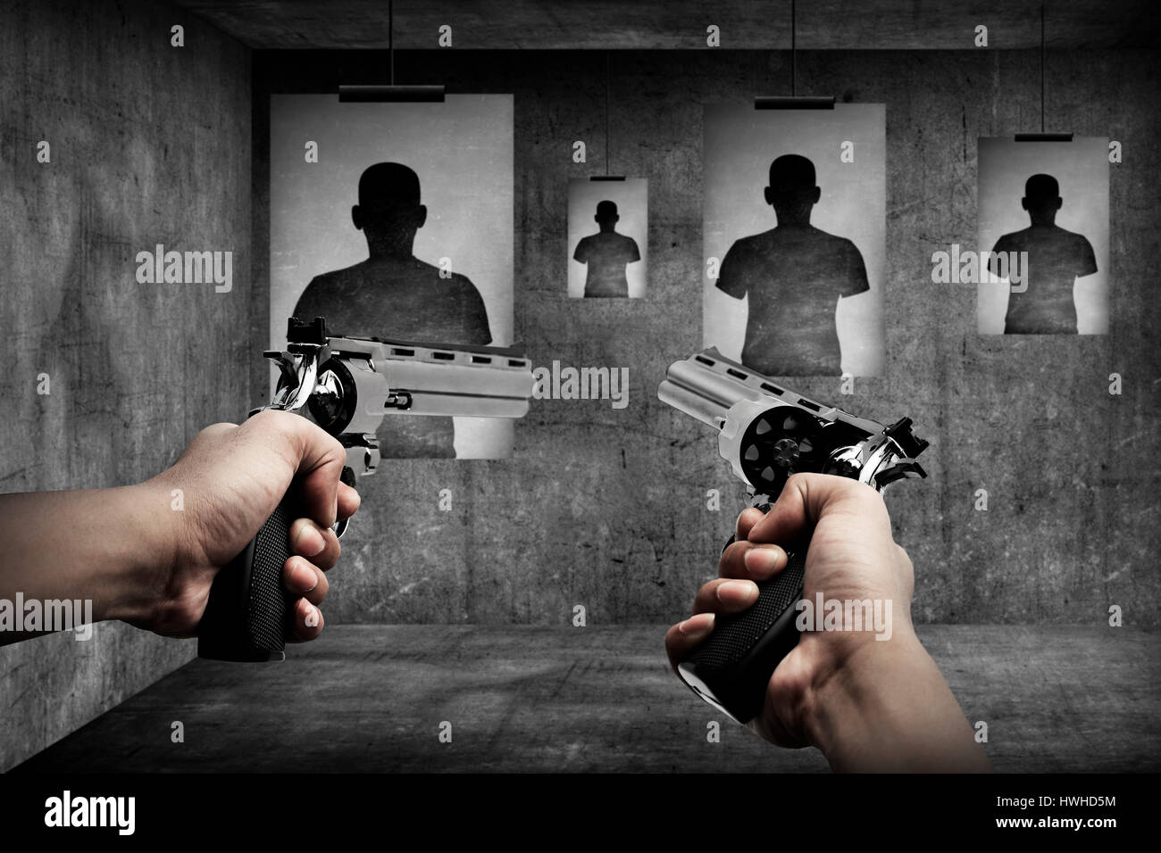 Man hand holding gun on the shooting range Stock Photo - Alamy