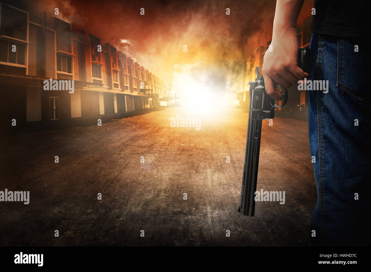 Man hand holding gun on the residential place Stock Photo - Alamy