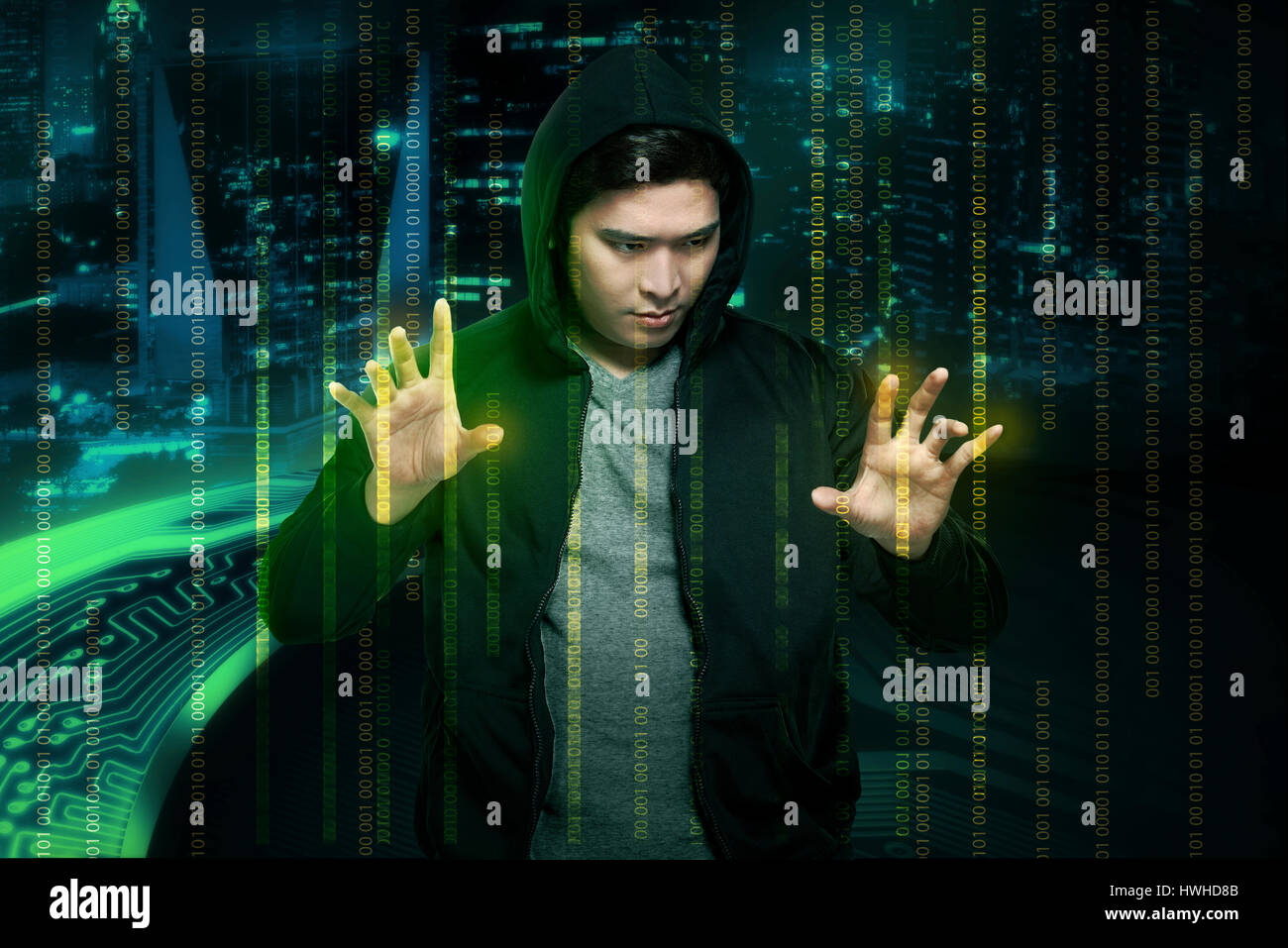 Man in hoodie shirt hacker hi-res stock photography and images - Alamy