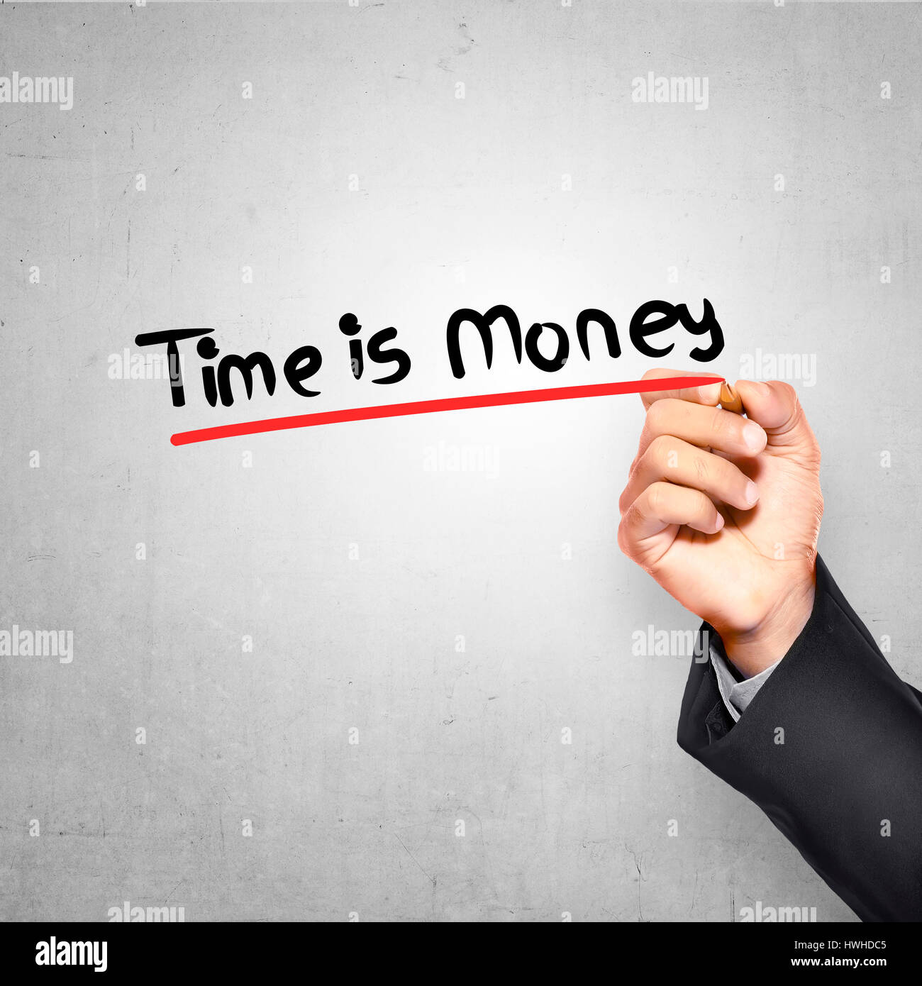 Man writing with pen time is money text over grunge background Stock ...