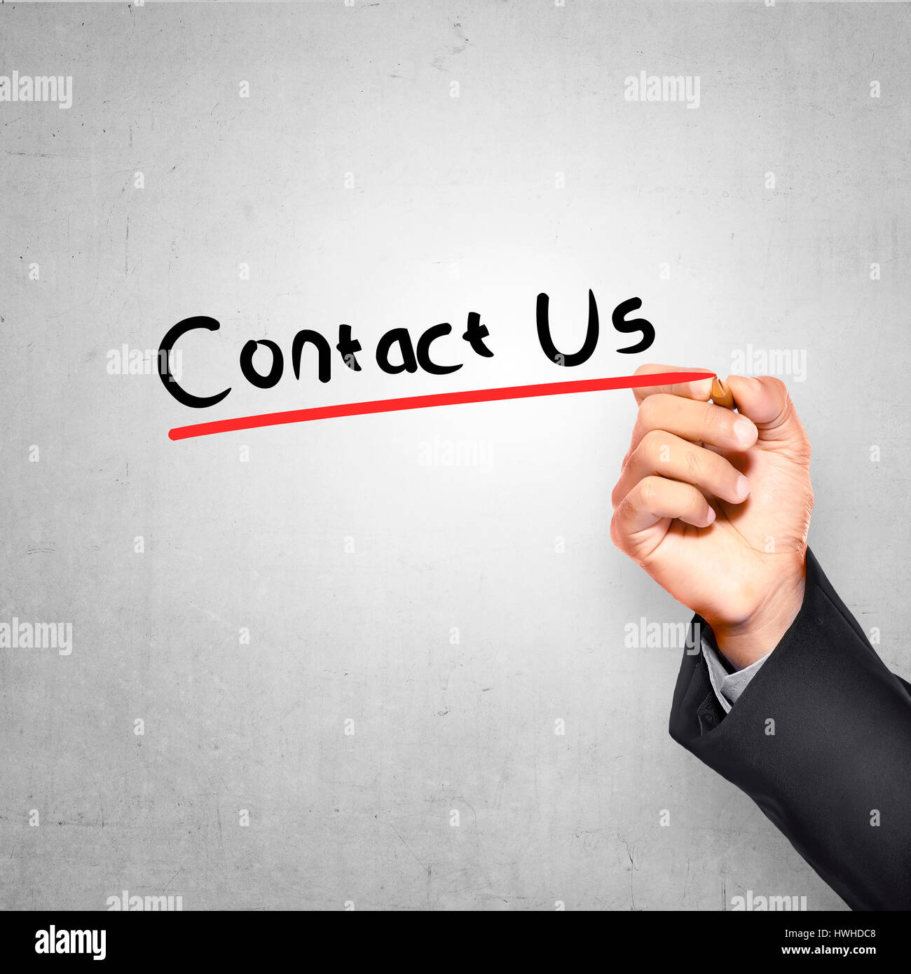 Man writing with pen contact us text over grunge background Stock Photo ...