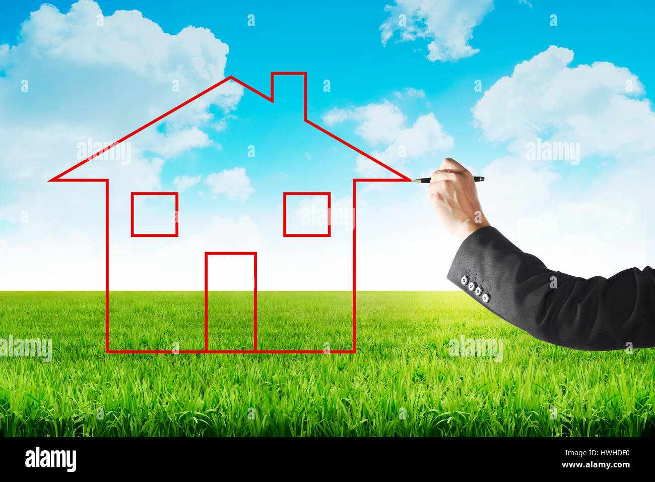 Business man drawing house on the meadow with blue sky background Stock ...