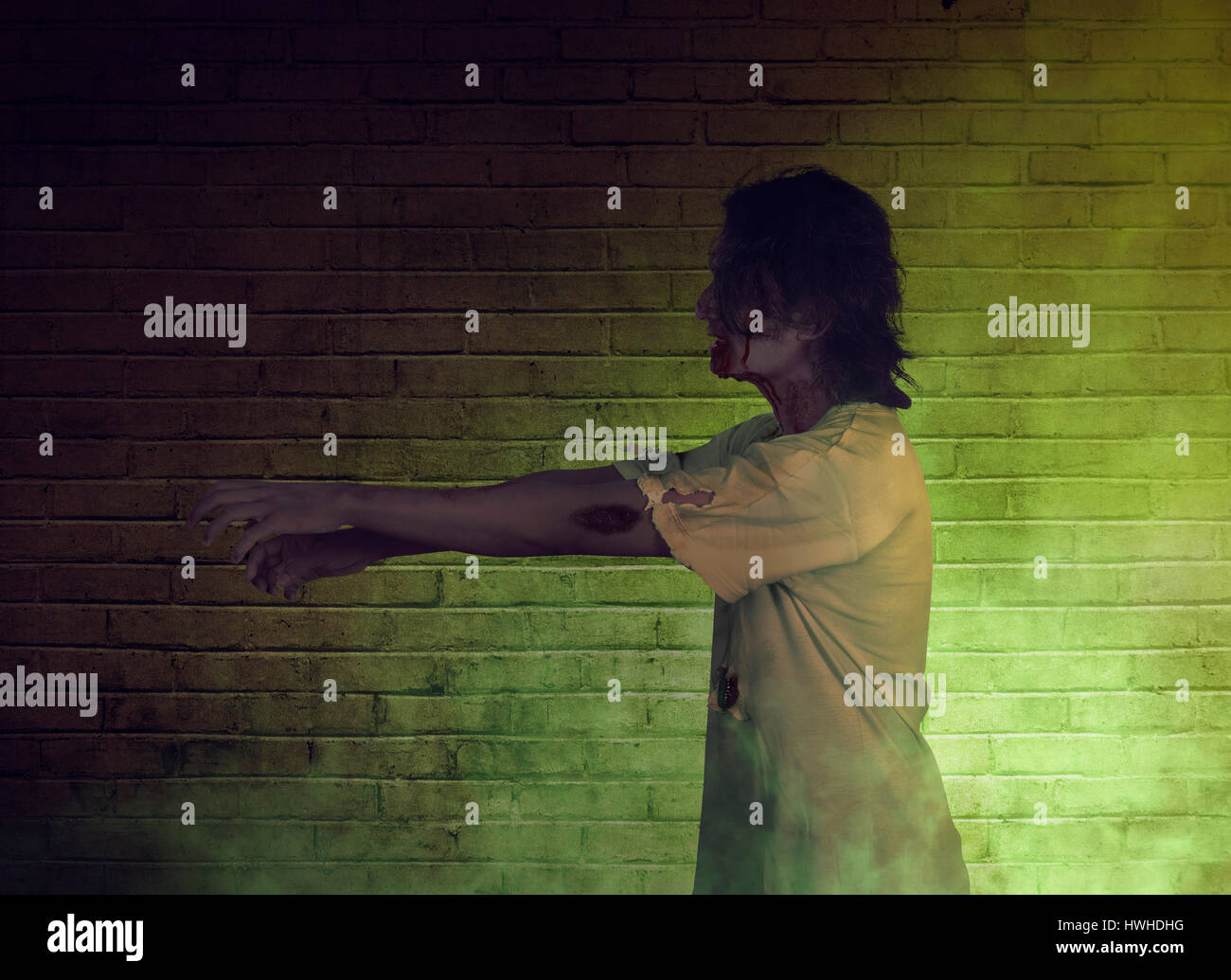 Side view of asian zombie man in the empty room Stock Photo - Alamy