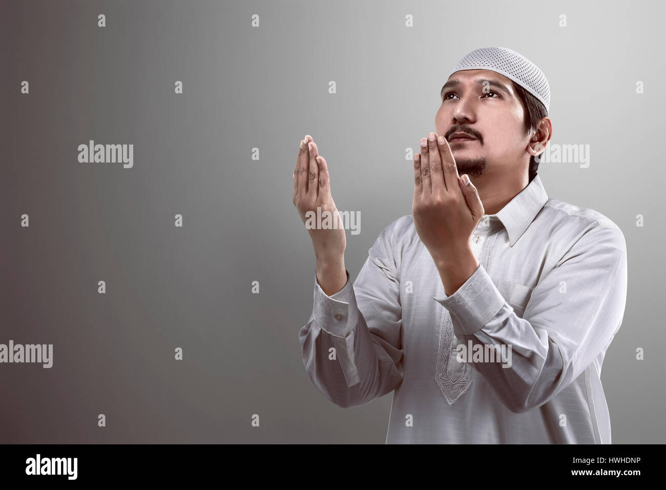 Image of young muslim man praying. Islamic conceptual Stock Photo - Alamy