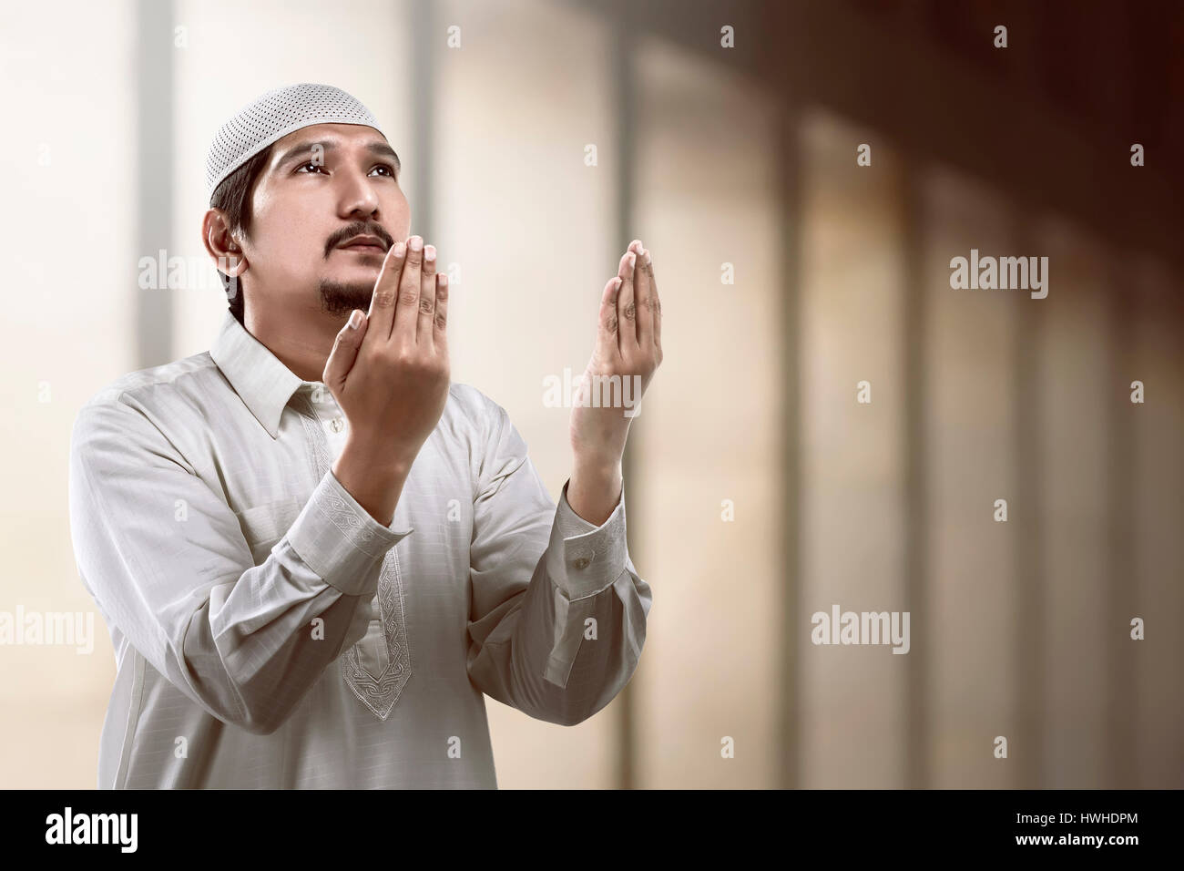 Image of young muslim man praying. Islamic conceptual Stock Photo - Alamy