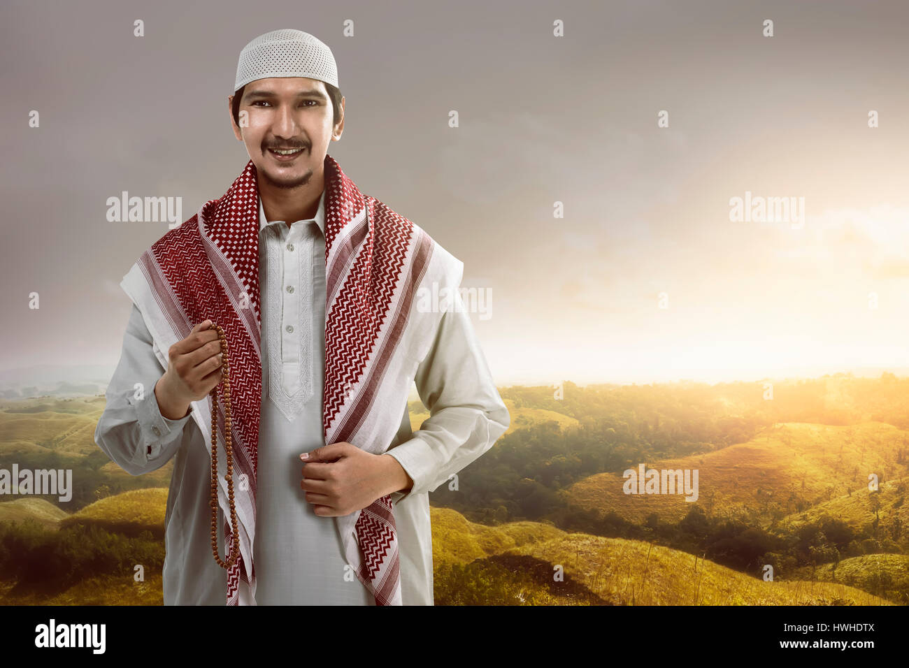 Image of handsome asian muslim man smiling Stock Photo - Alamy