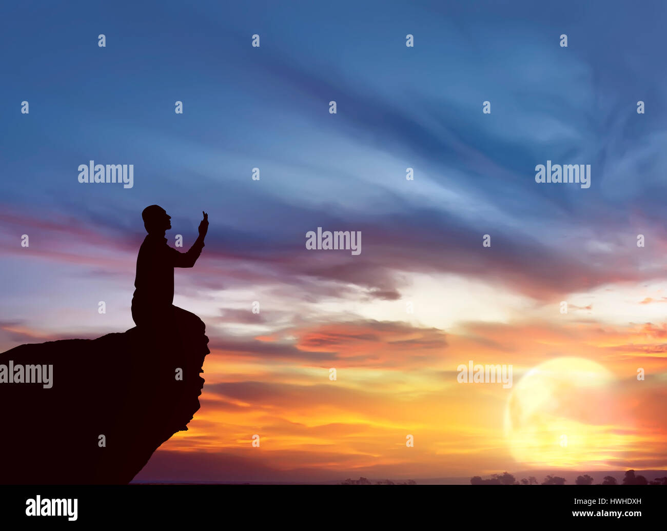 Silhouette of man praying at sunset. He pray to god Stock Photo - Alamy