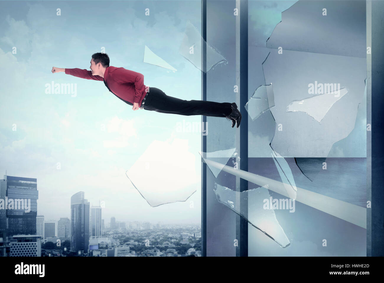 Business man flying through office building window. Business freedom ...