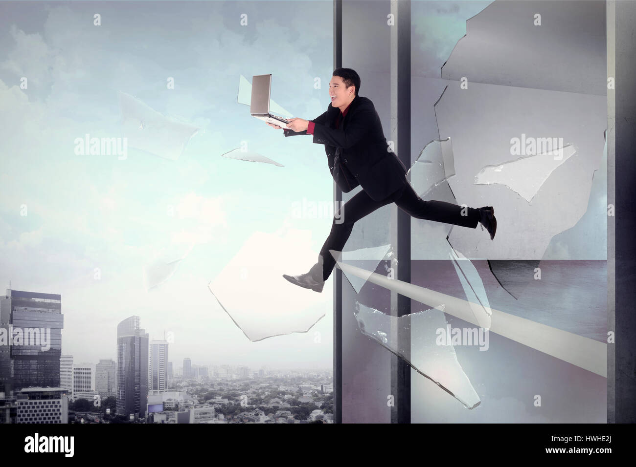 Jump through window hi-res stock photography and images - Alamy