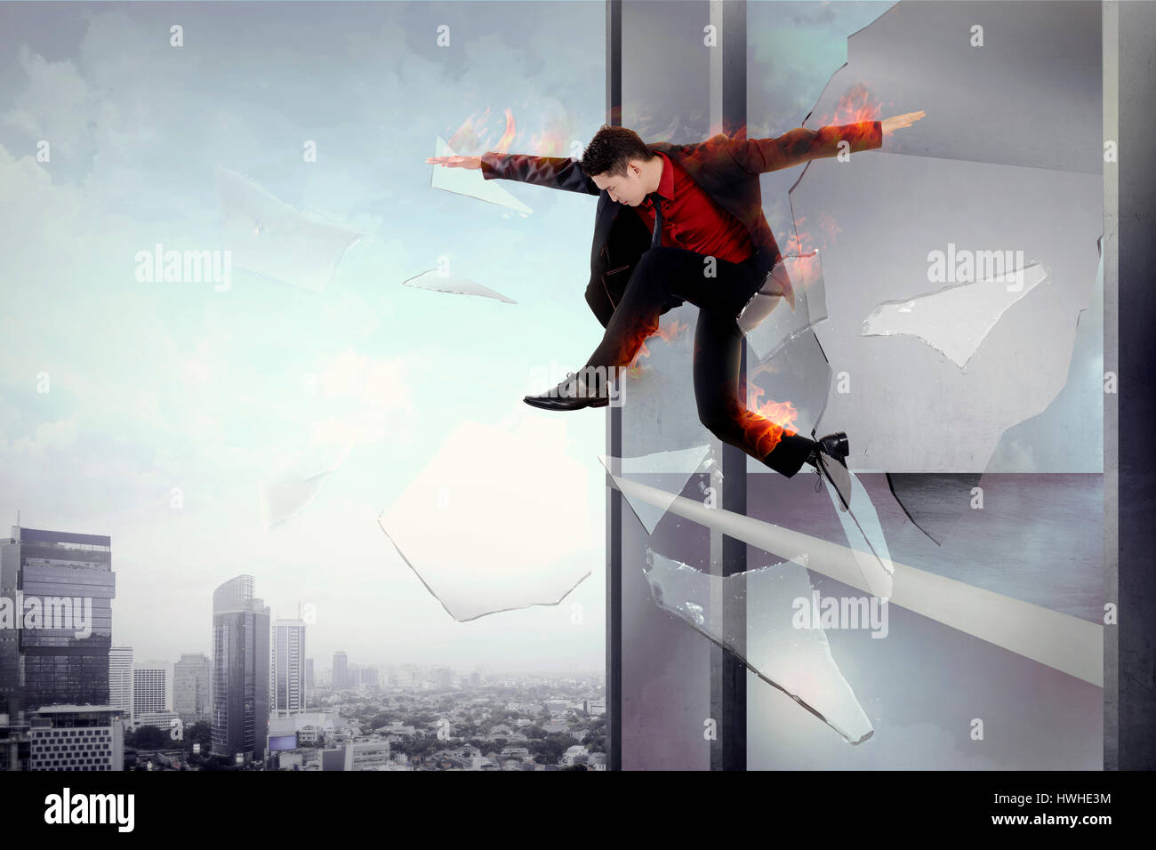 Man escape from office through window with flame all over body. Risky ...