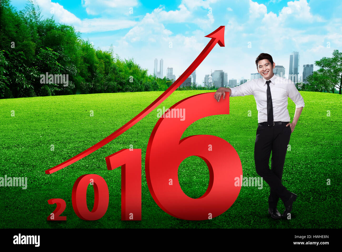 Asian business person lean next to 2016 number. New year resolution ...