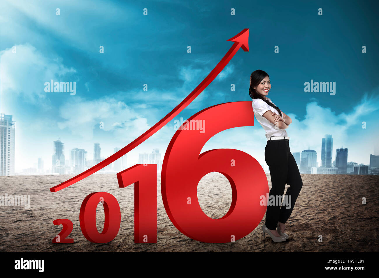 Asian business person lean next to 2016 number. New year resolution ...