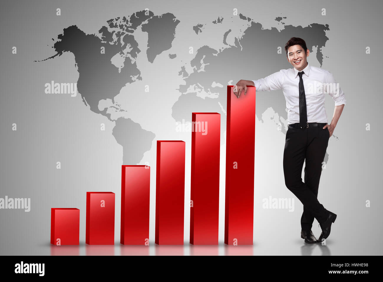 Asian business man lean on increasing graph Stock Photo - Alamy