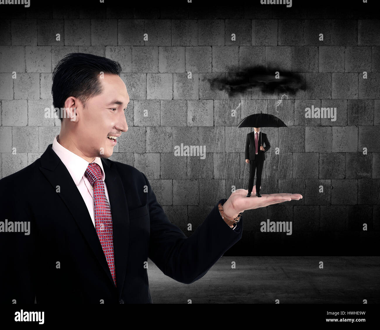 Black suit with umbrella hi-res stock photography and images - Alamy