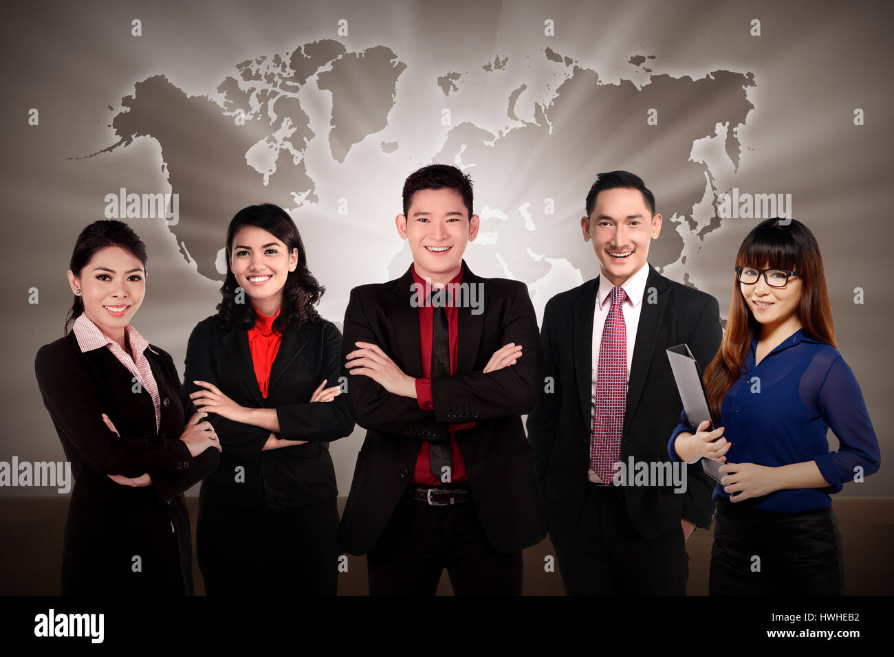 Asian business team with world map background Stock Photo - Alamy