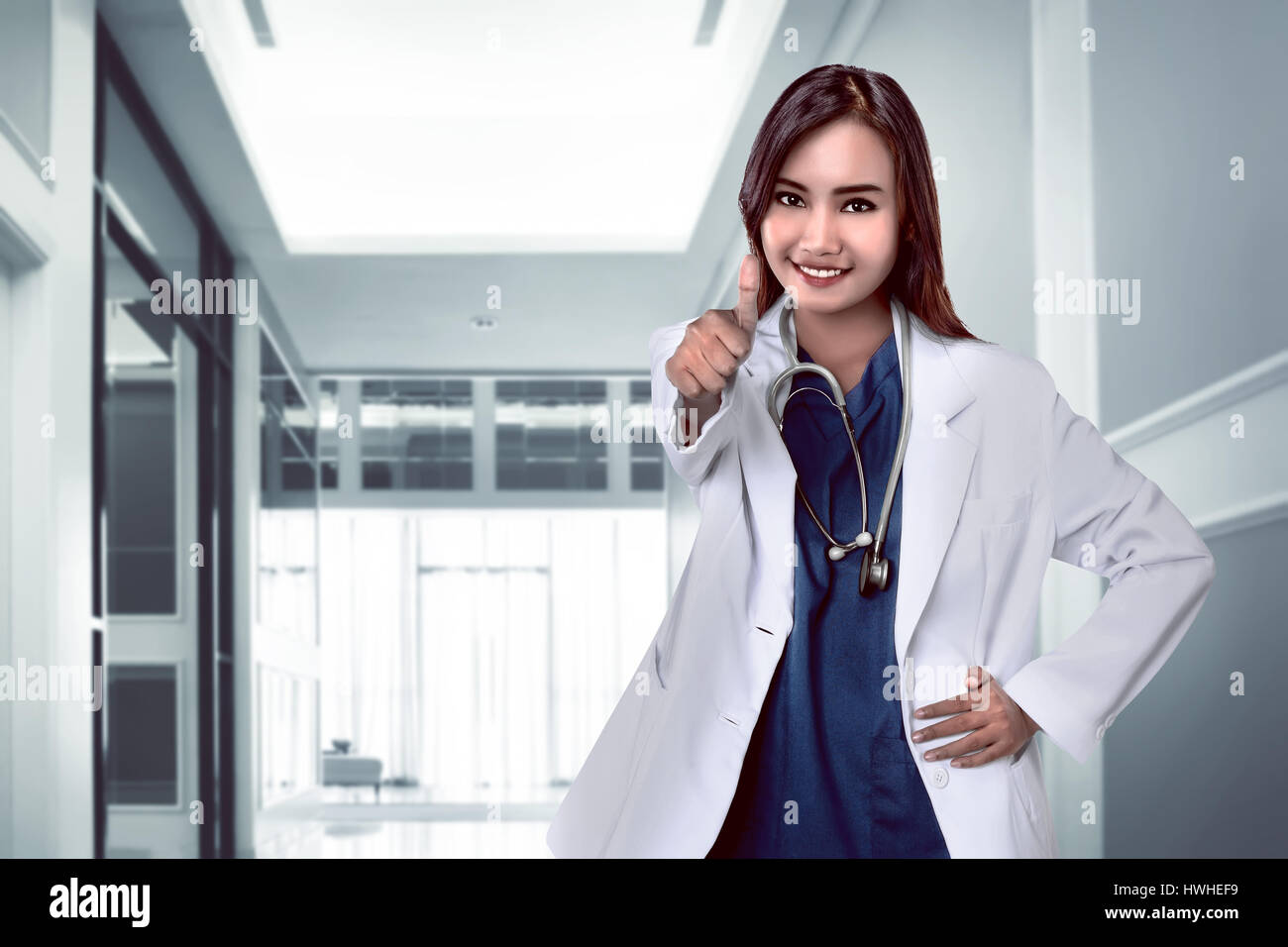 Image of pretty asian doctor smiling with hospital background Stock ...