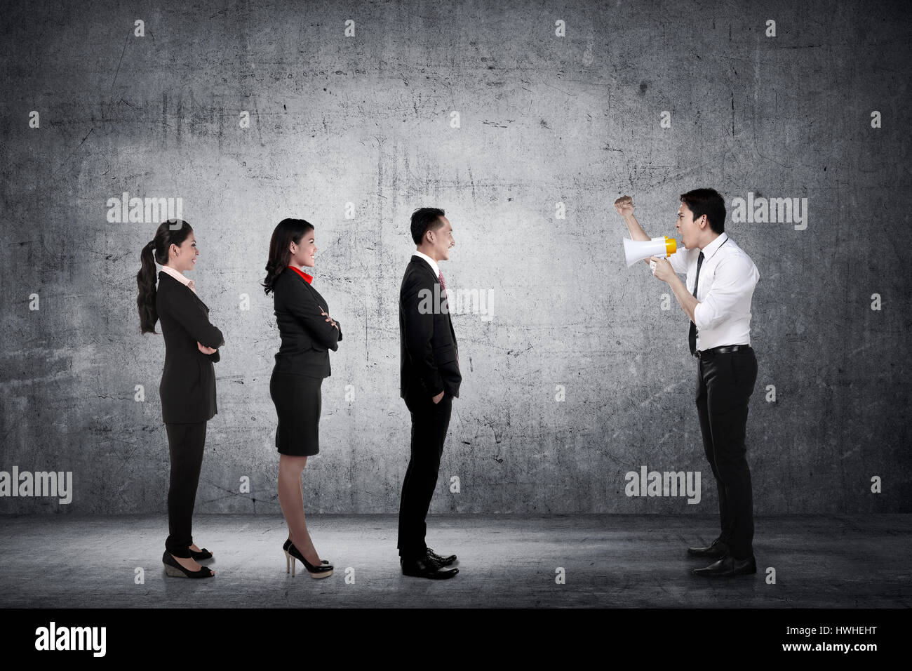Leader give order via megaphone to his subordinate. Business ... Leader give order via megaphone to his subordinate. Business ...
