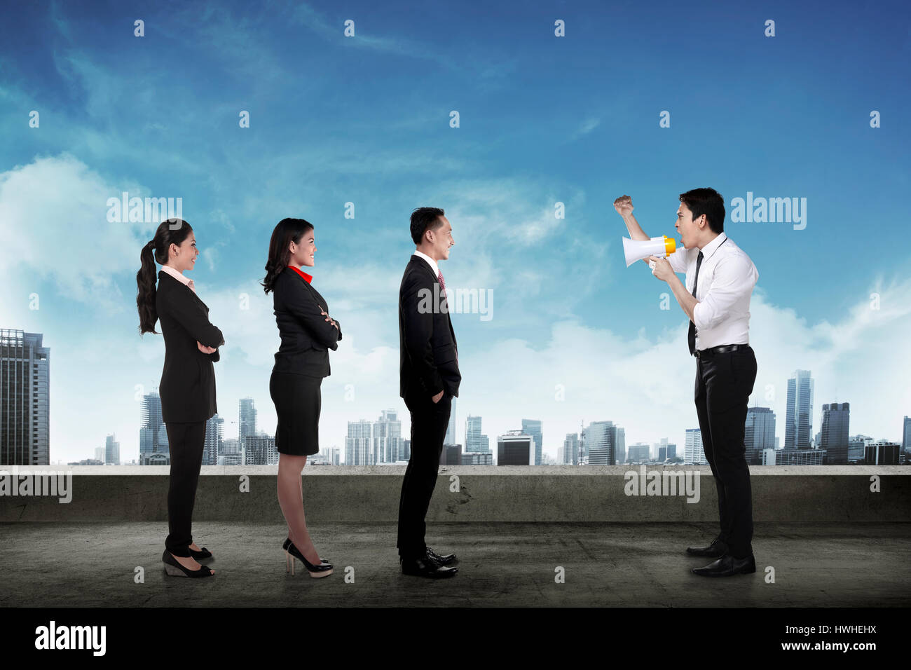 Leader give order via megaphone to his subordinate. Business ... Leader give order via megaphone to his subordinate. Business ...