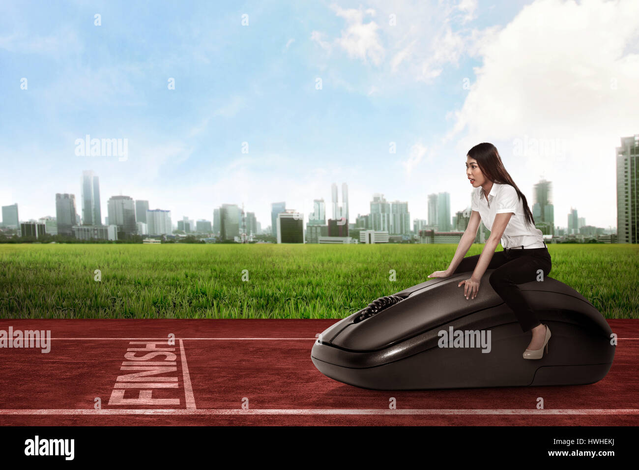 Asian business person riding computer mouse. Business technology ...