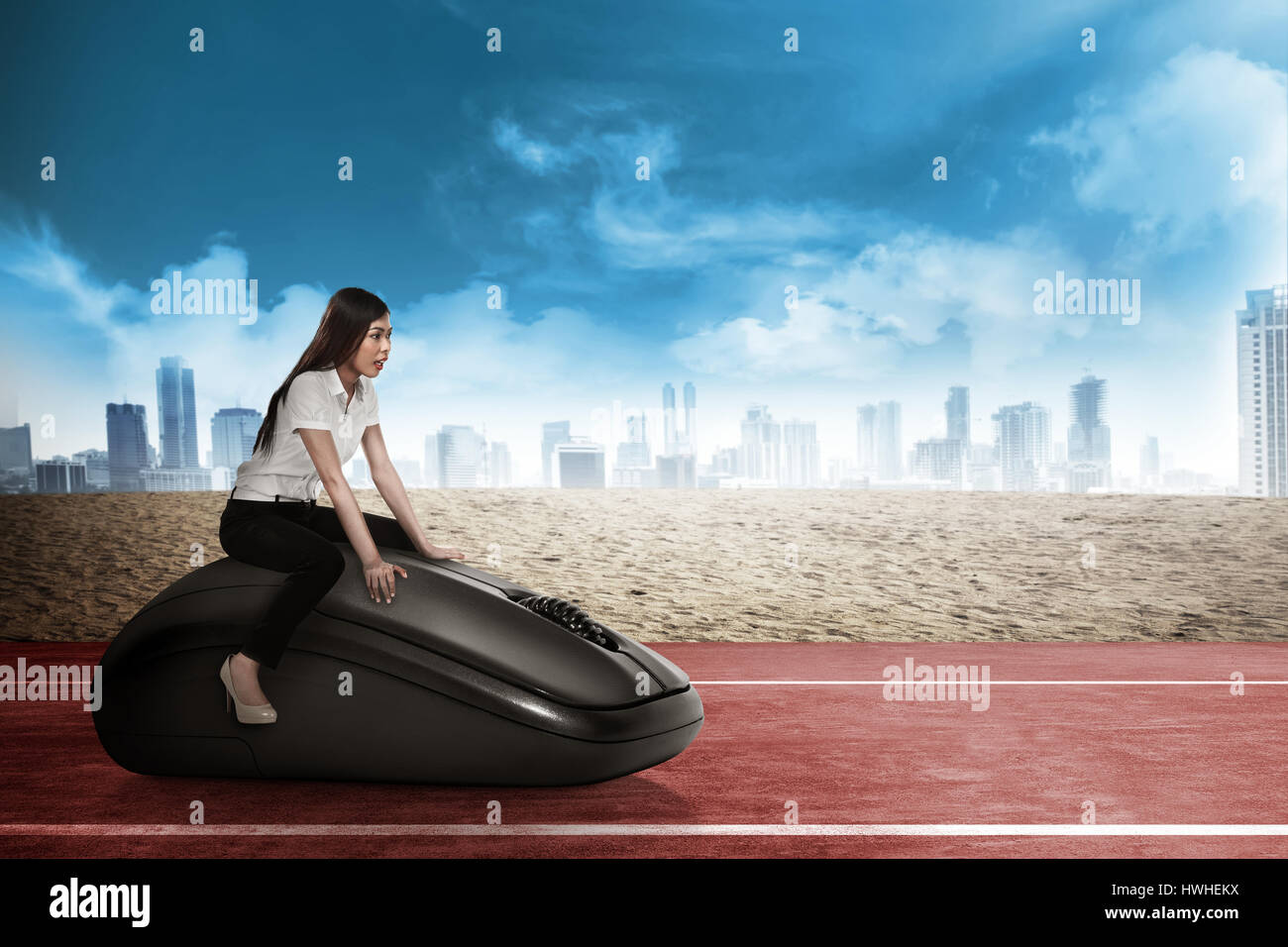 Asian business person riding hi-res stock photography and images - Alamy