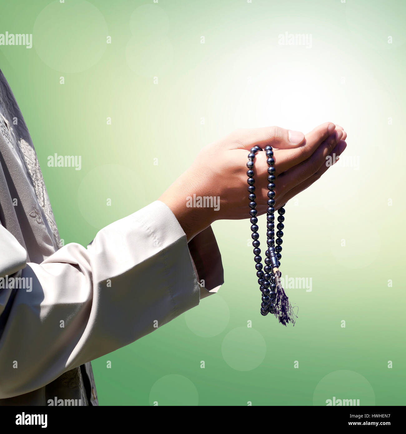 Hand of muslim people praying with abstract background Stock Photo - Alamy