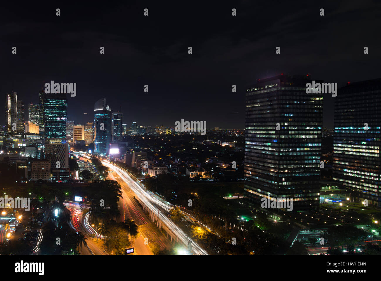 Jakarta night cityscape with vehicle light trails Stock Photo - Alamy