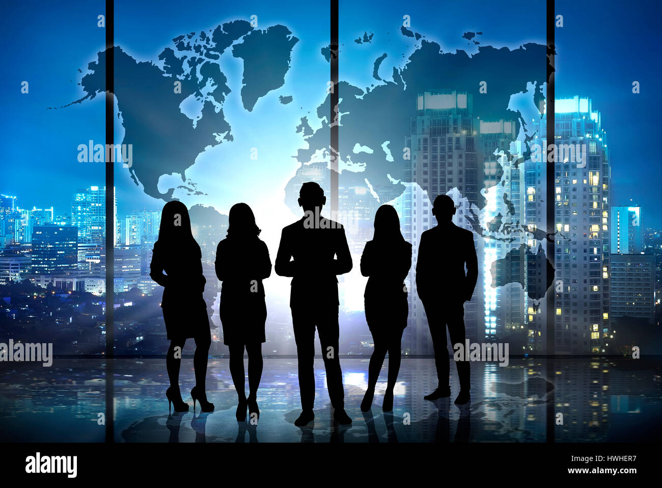 Silhouette of successful business team over world map background Stock ...