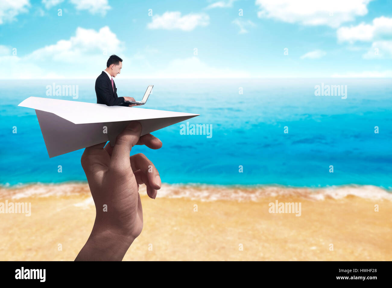 Business man typing with laptop on the paper plane ready to fly Stock ...