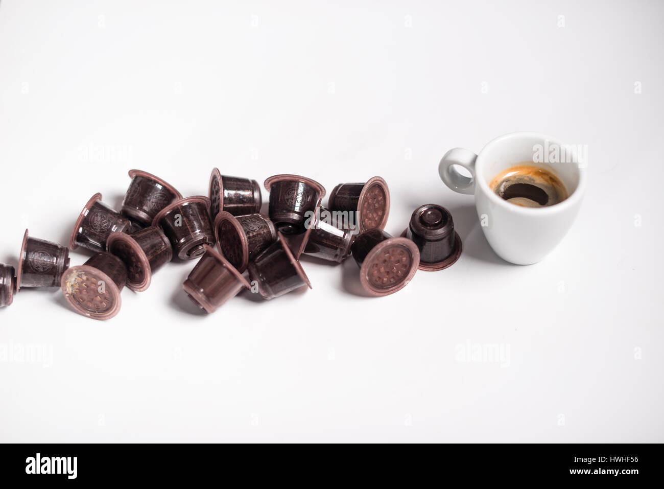 used coffee capsules and espresso coffee Stock Photo - Alamy