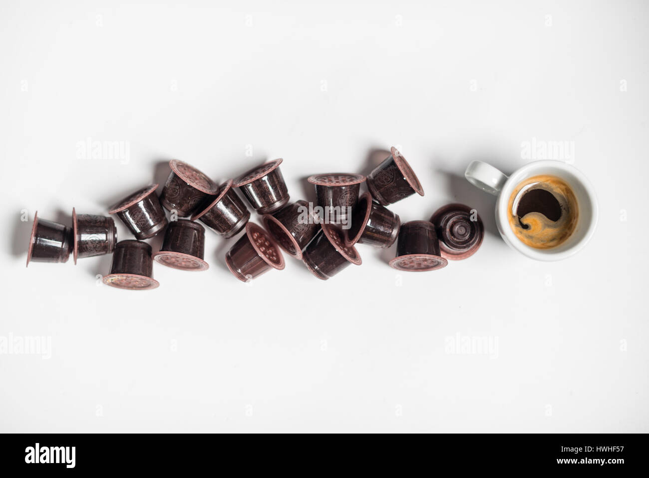 used coffee capsules and espresso coffee Stock Photo - Alamy