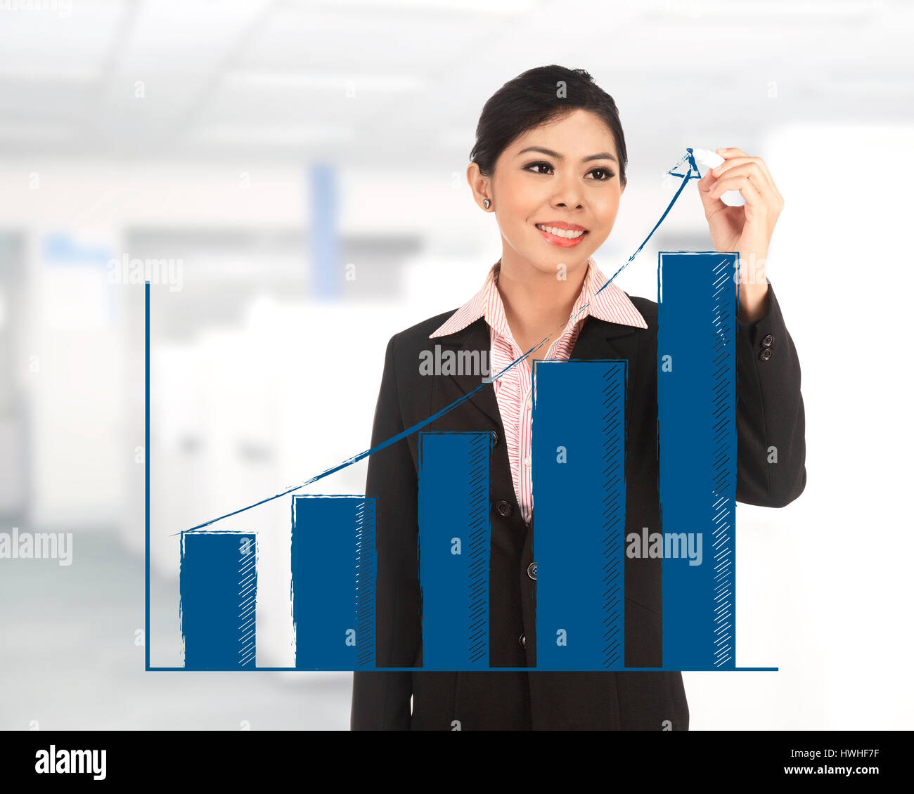 Business woman draw increasing chart with office background Stock Photo ...