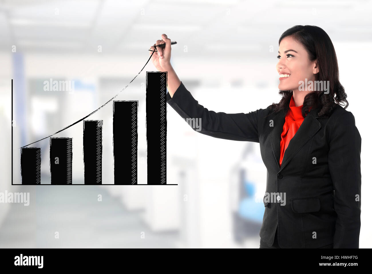 Business woman draw increasing chart with office background Stock Photo ...