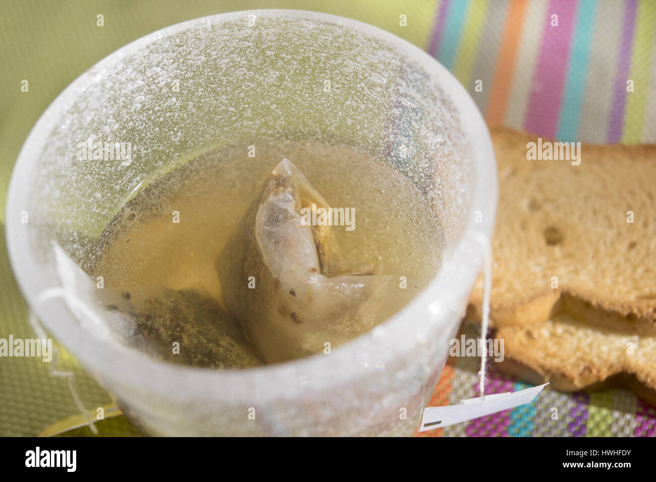 herbal tea filter in infusion in hot water Stock Photo - Alamy