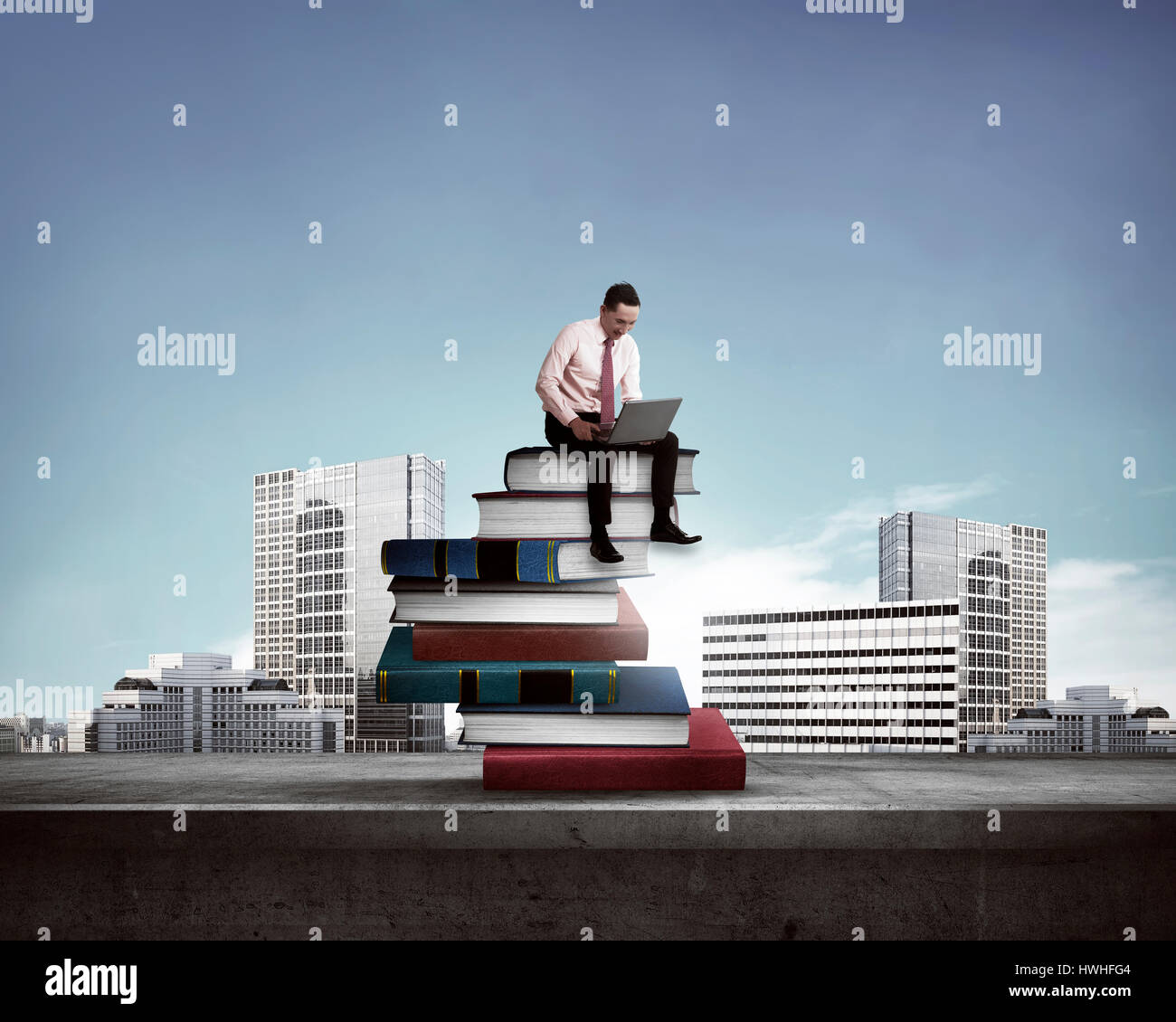 Business person working with laptop on the top of books. Career and ...