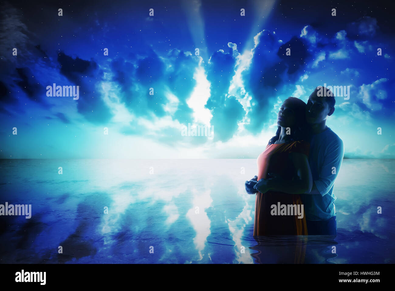 Moon light romantic couple on beach hi-res stock photography and images ...