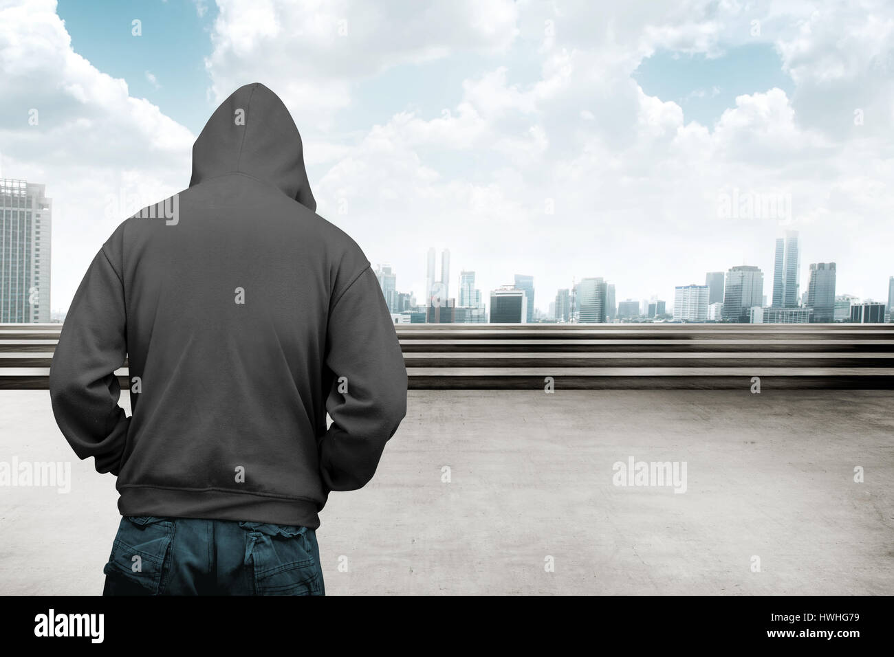 Hooded person dark street hi-res stock photography and images - Alamy