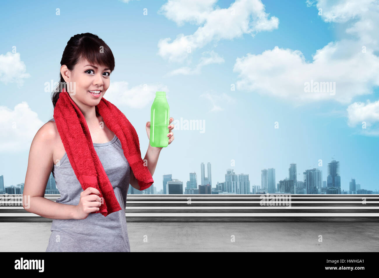 Happy asian woman after exercise in the middle of the city Stock Photo ...