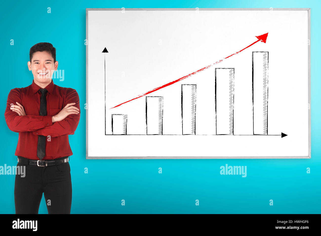 Young man with white board. There increasing chart image Stock Photo ...