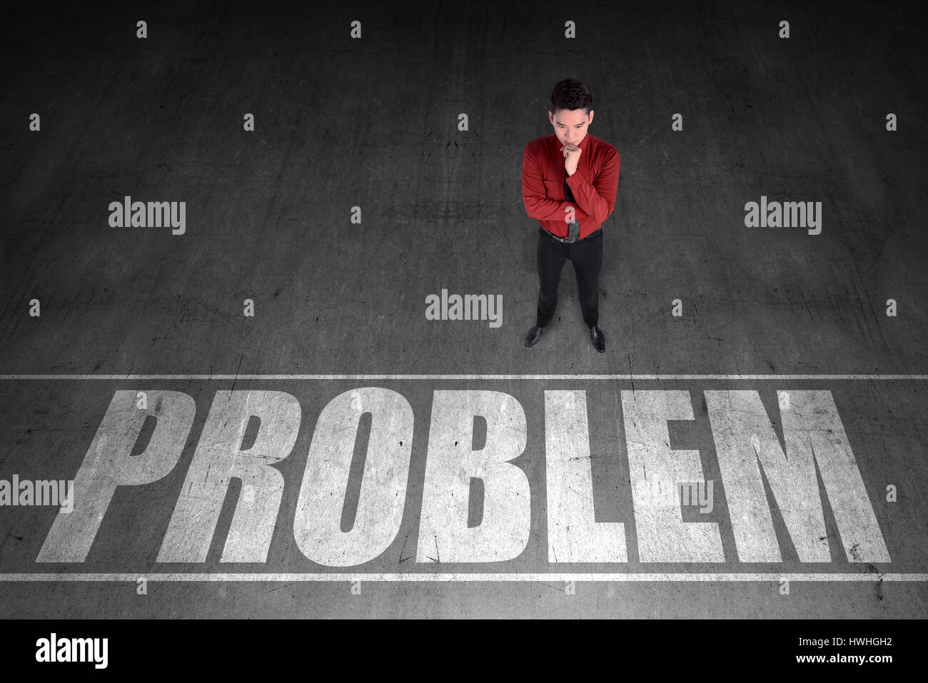 Business person looking problem word on the floor Stock Photo - Alamy