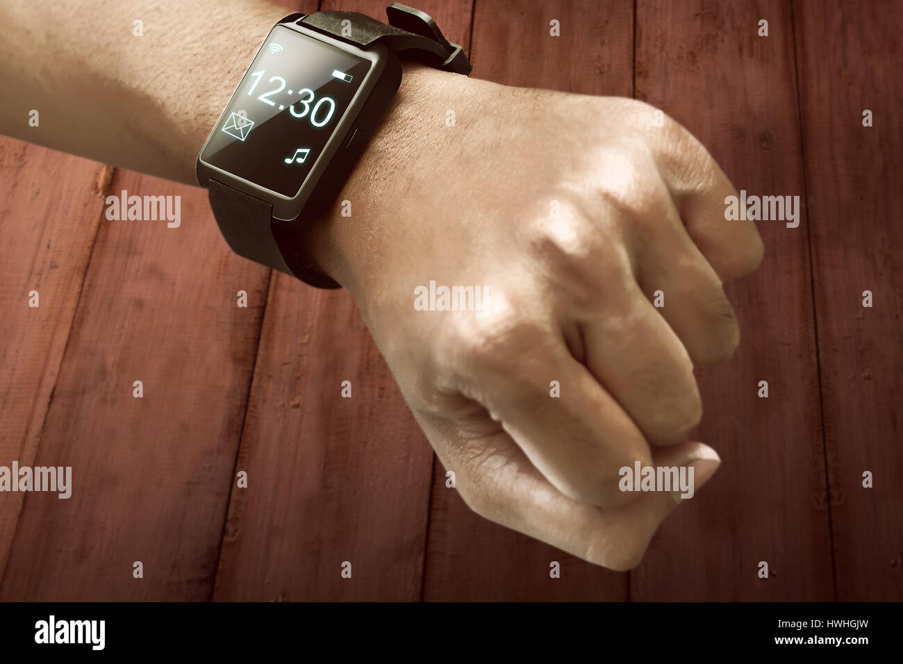 Human hand wearing smart watch. Wearable gadget concept Stock Photo - Alamy