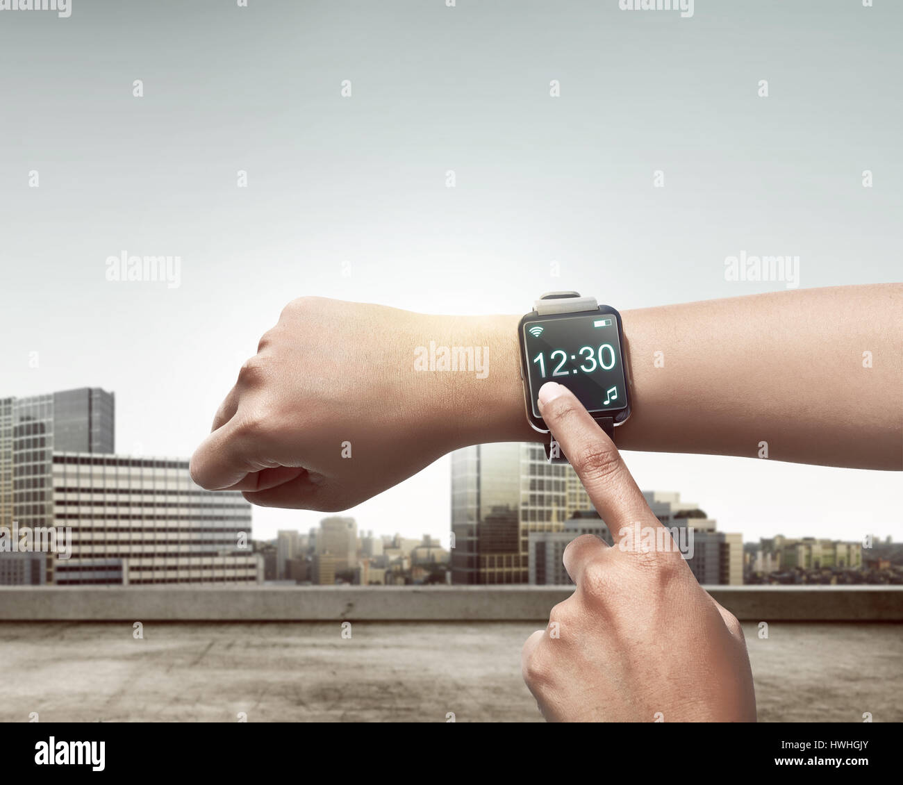 Hand setting time on smartwatch. Gadget technology concept Stock Photo ...