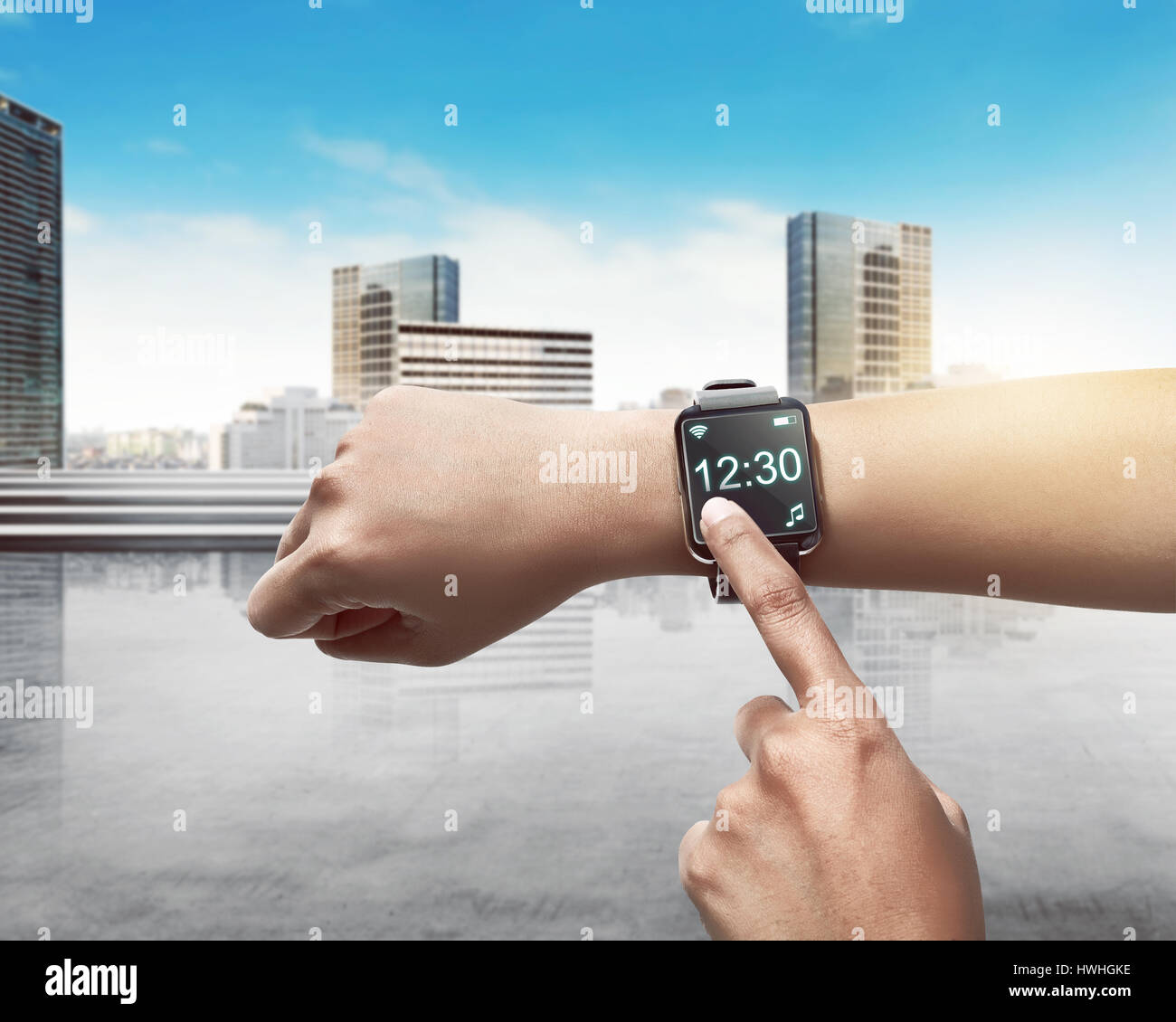 Hand setting time on smartwatch. Gadget technology concept Stock Photo ...
