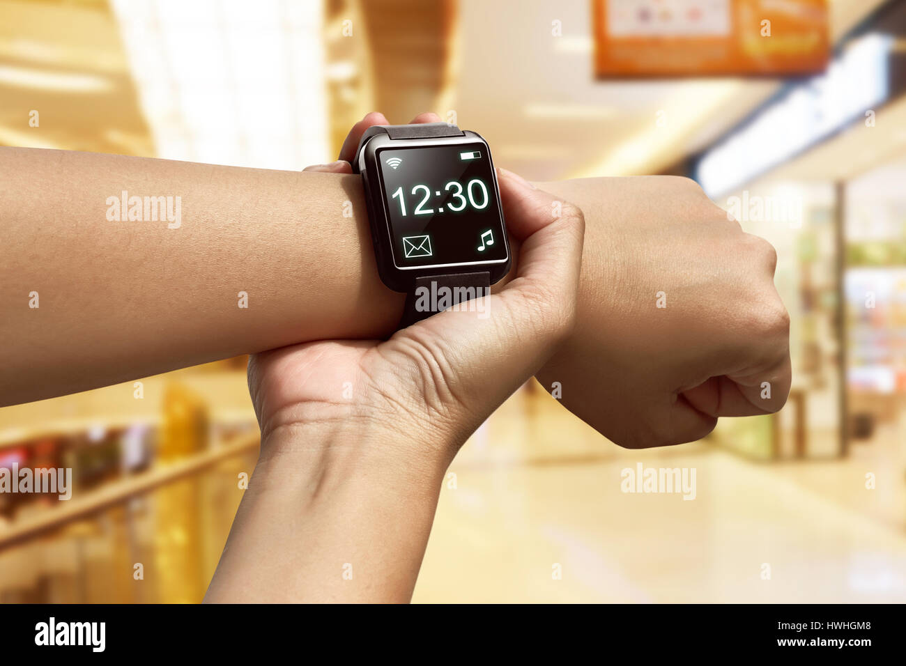 Hand setting time on smartwatch. Gadget technology concept Stock Photo ...
