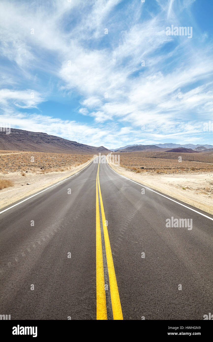 Endless desert road in Death Valley, travel concept, USA Stock Photo ...