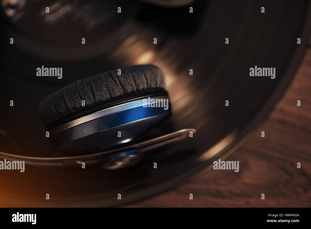 vinyl record and headphone over wooden table. Audio enthusiast,music ...