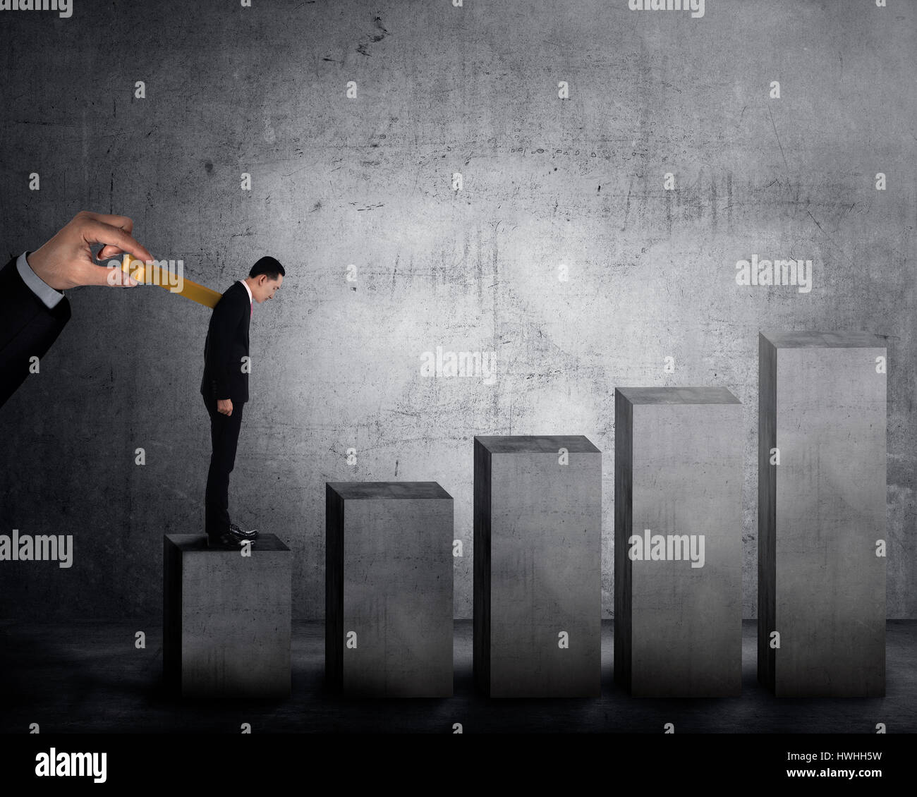 Hand turns clockwork on the back of business person, concept to control ...